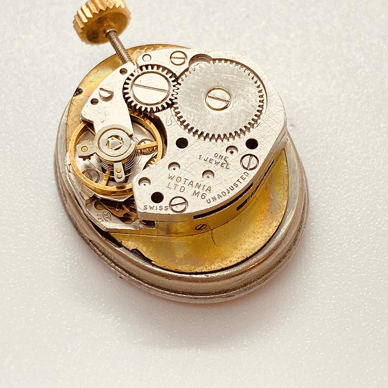 Revlon Swiss Made Oval Wotania M6 Watch for Parts & Repair – Vintage Radar